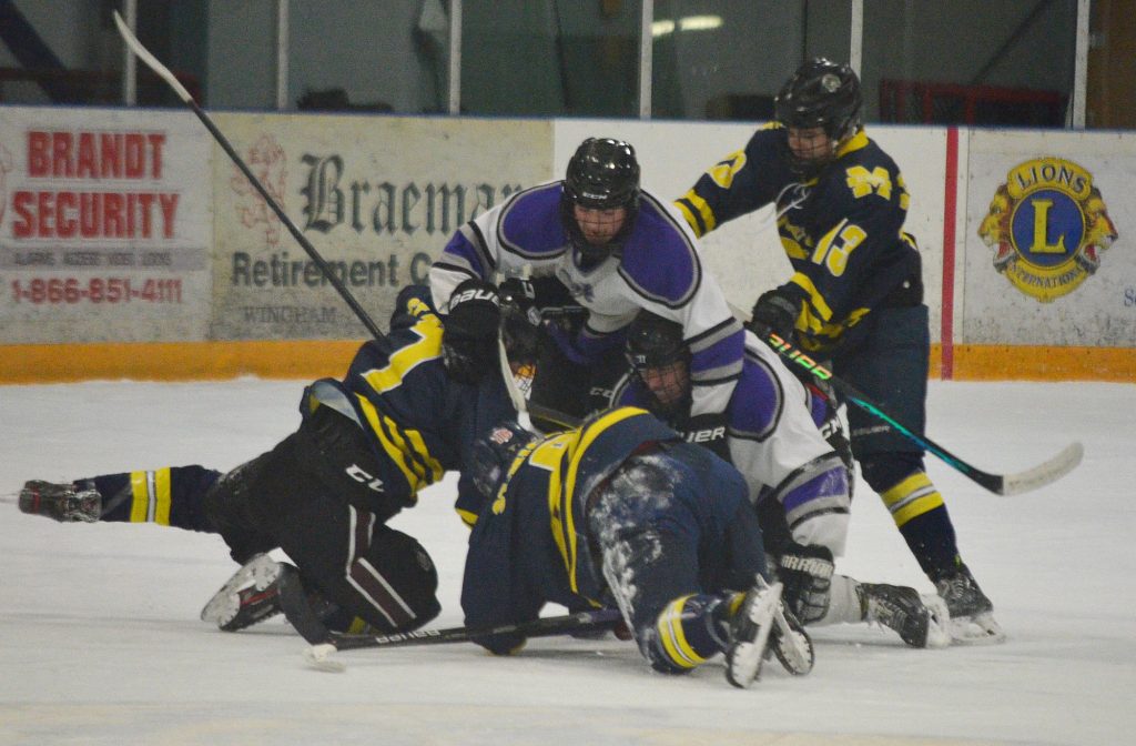 Girls win, boys lose as Madill opens varsity hockey season